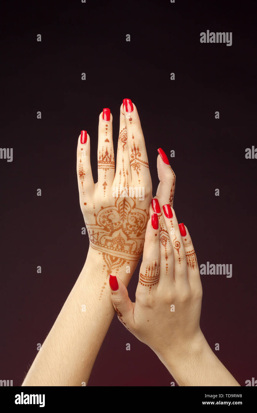 Woman Hands with mehndi Stock Photo - Alamy