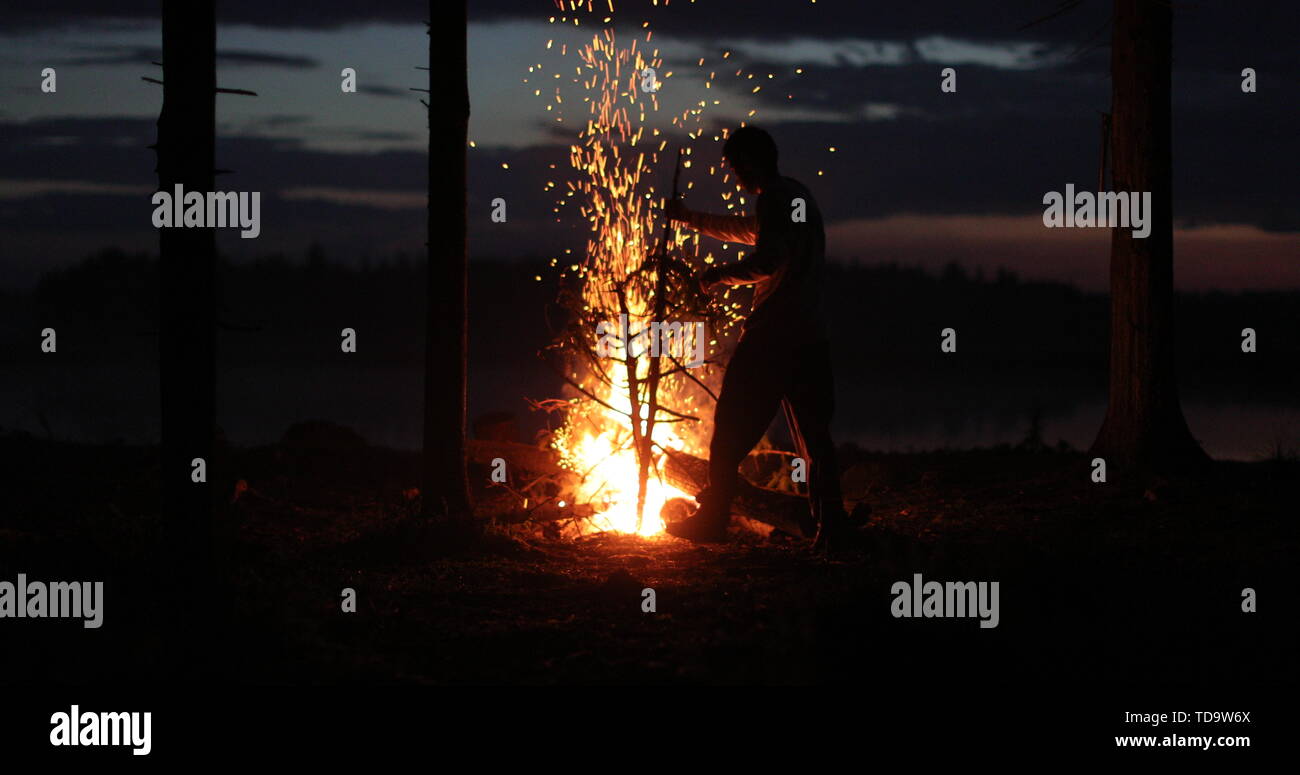 Man near fire hi-res stock photography and images - Alamy