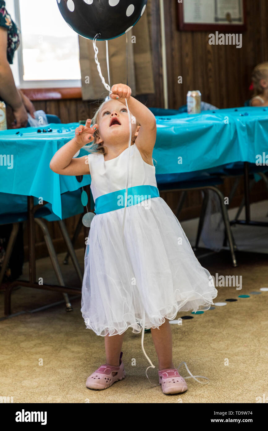 Child playing with balloons hi-res stock photography and images - Alamy