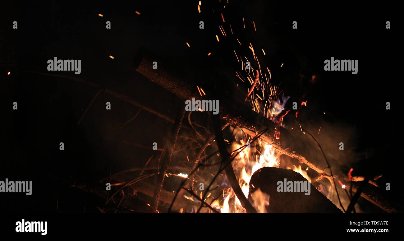 bright flaming of fire and hot wood at night Stock Photo - Alamy
