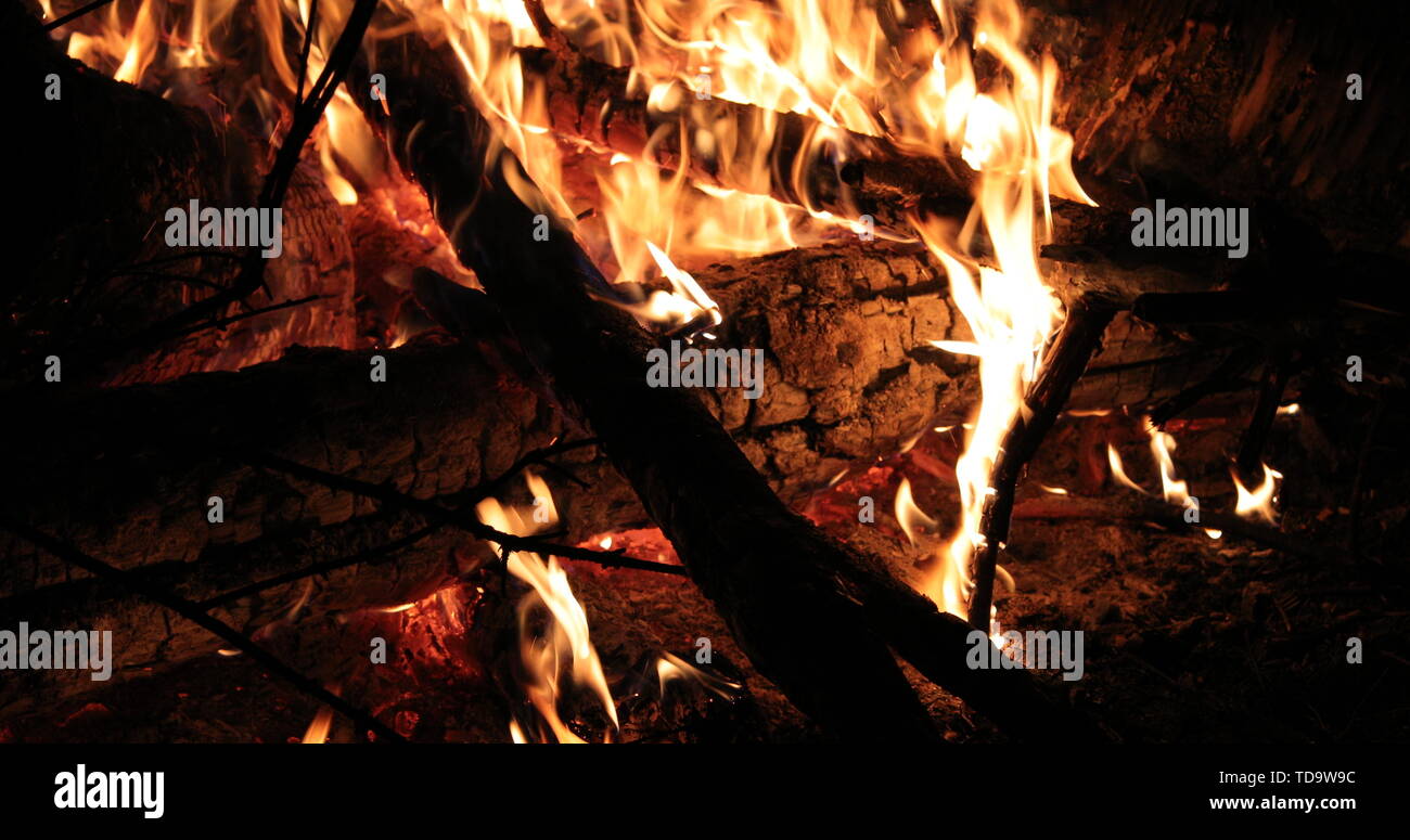 bright flaming of fire and hot wood at night Stock Photo - Alamy