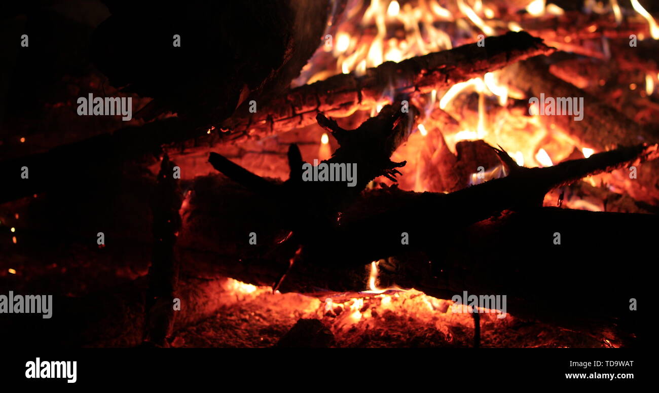 bright flaming of fire and hot wood at night Stock Photo - Alamy