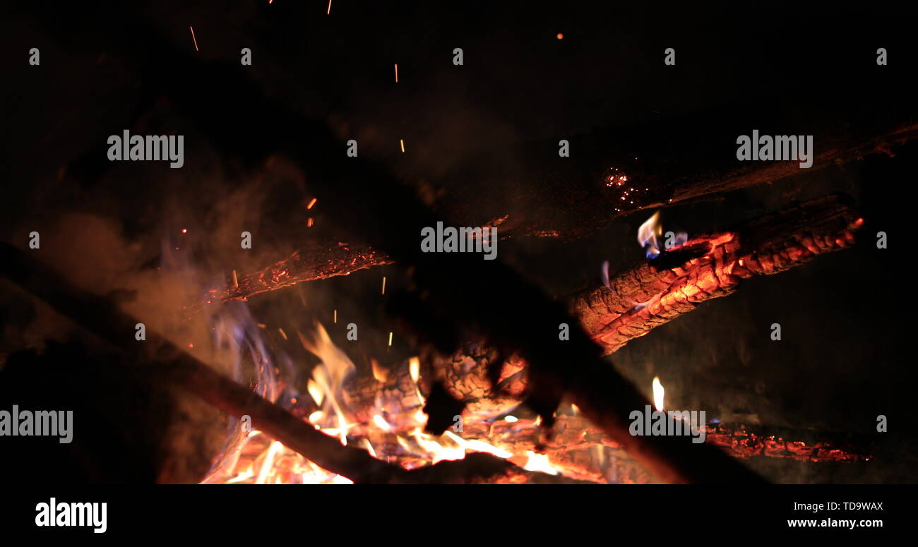 bright flaming of fire and hot wood at night Stock Photo - Alamy