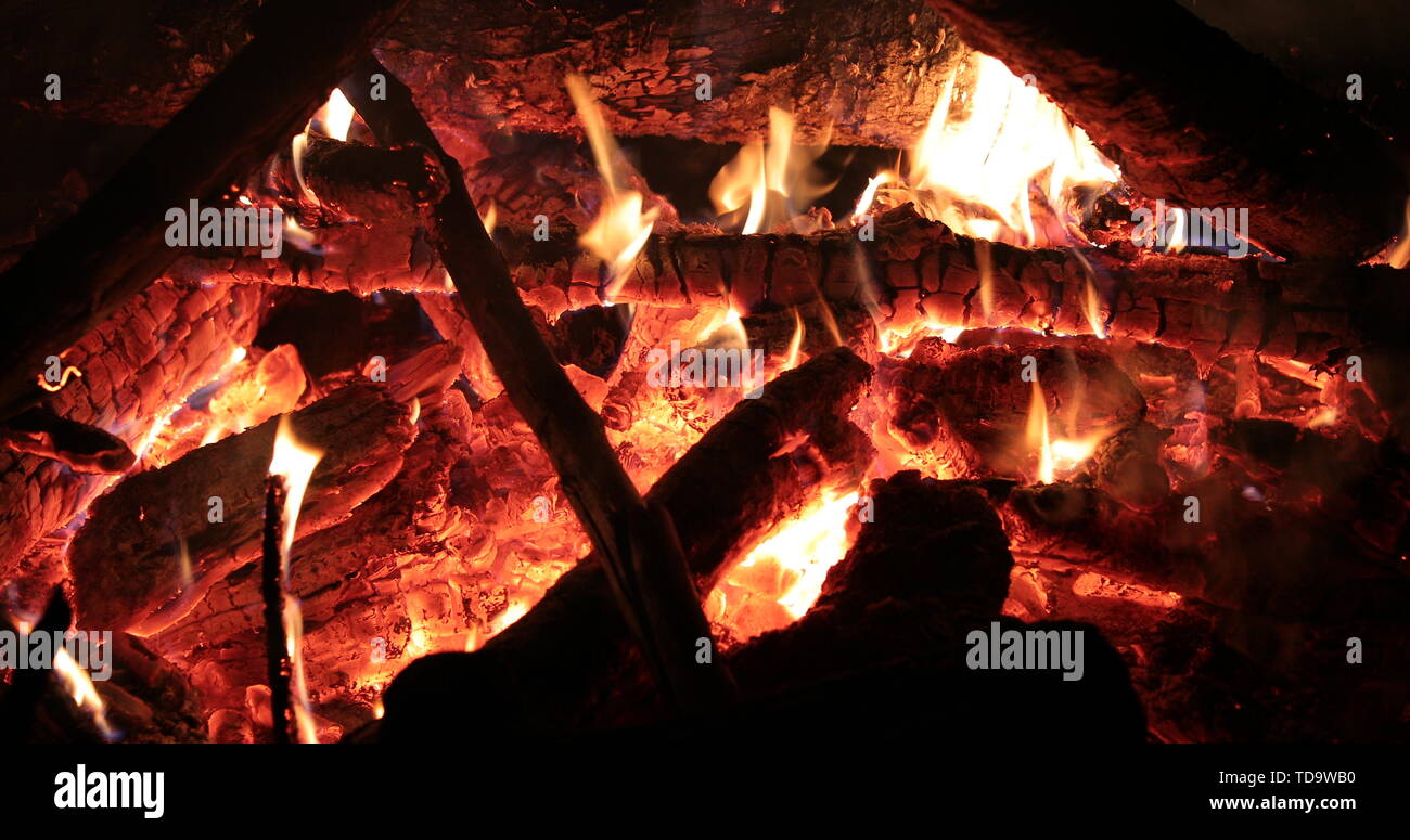 bright flaming of fire and hot wood at night Stock Photo - Alamy