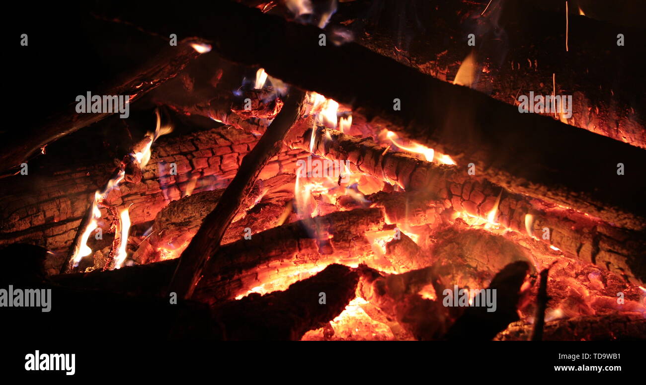 bright flaming of fire and hot wood at night Stock Photo - Alamy