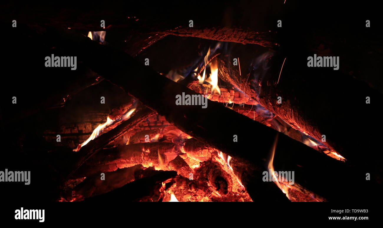 bright flaming of fire and hot wood at night Stock Photo - Alamy