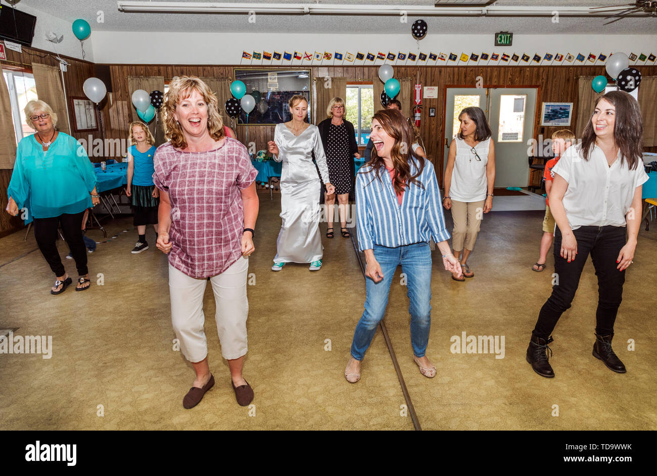 Wedding guests line dance at wedding reception; Congressional Church ...
