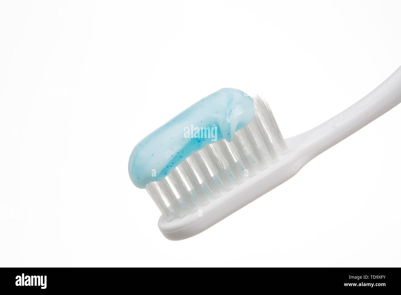 Blue toothpaste on the toothbrush Stock Photo - Alamy