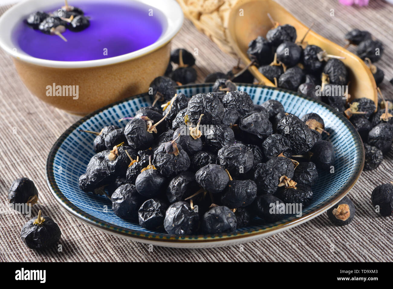 Black Chinese wolfberry tea high-definition big picture Stock Photo - Alamy
