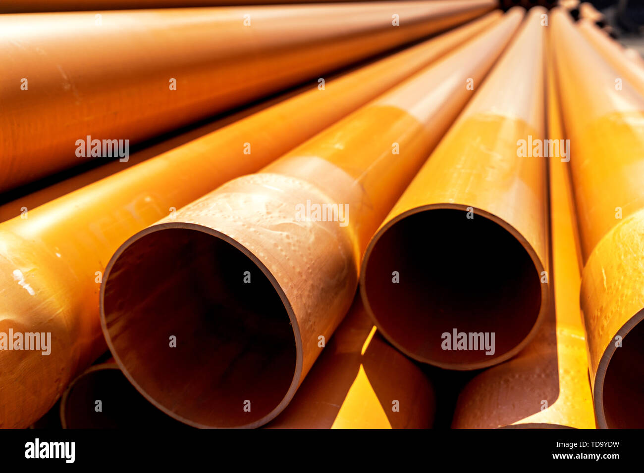 Stack of plastic pipes Stock Photo - Alamy