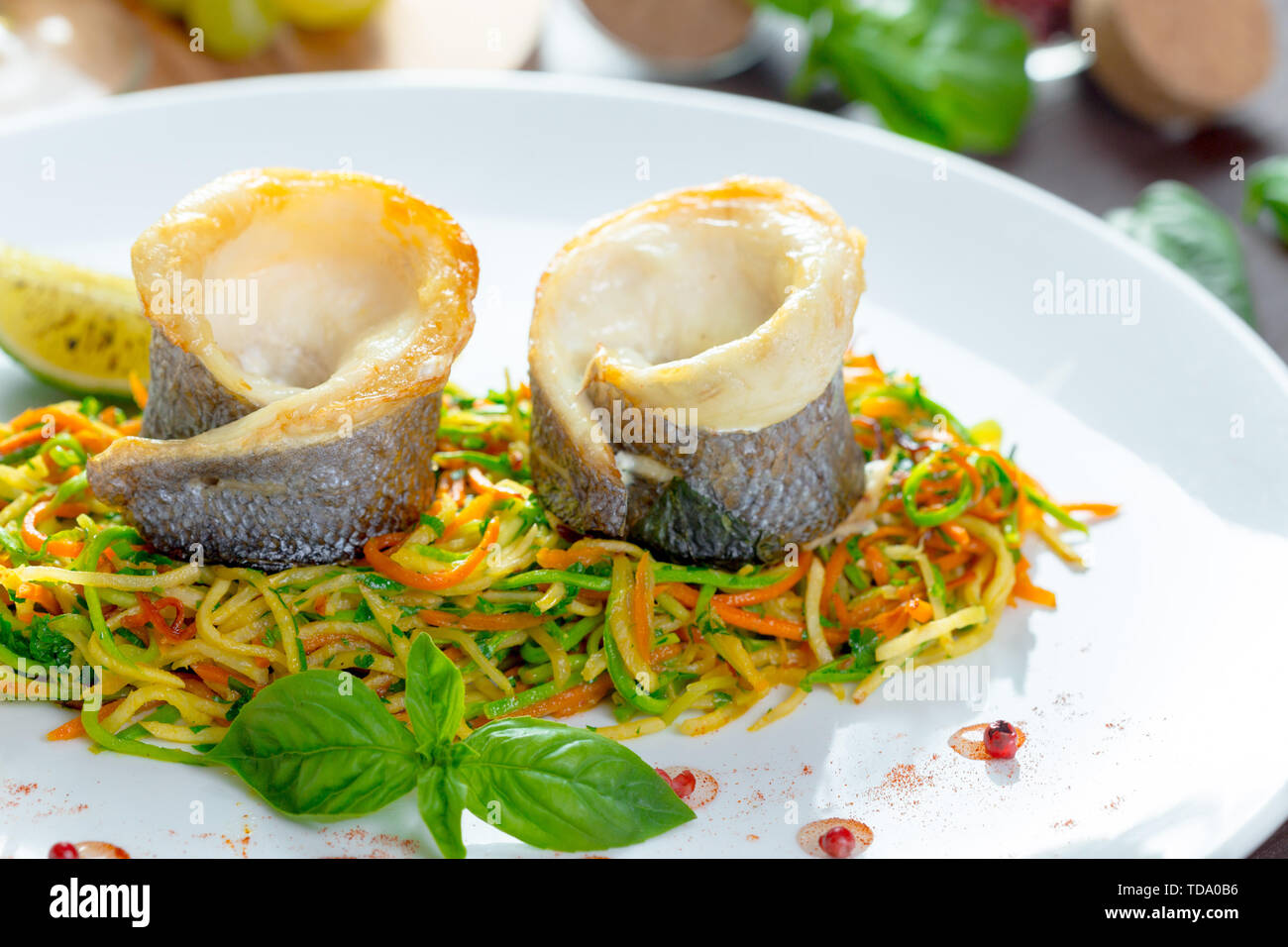 Fish dish - fried fish fillet Stock Photo - Alamy