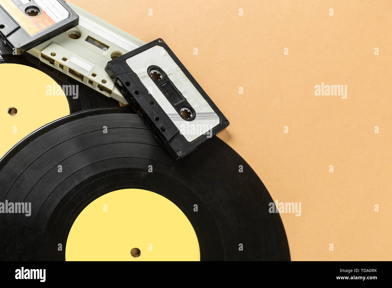 vinyl record on a beige background Stock Photo - Alamy