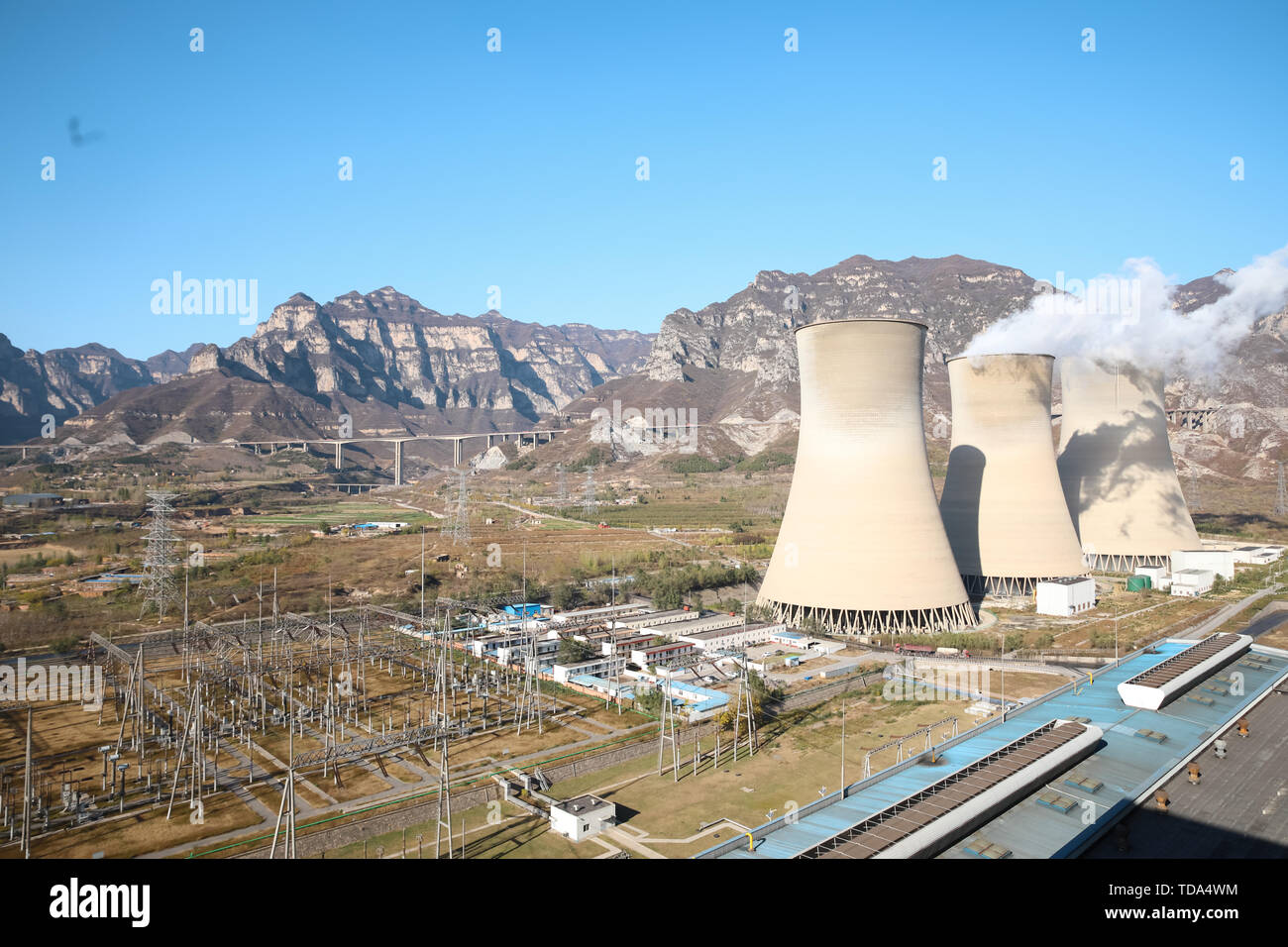 Power plant pipelines and substations Stock Photo - Alamy