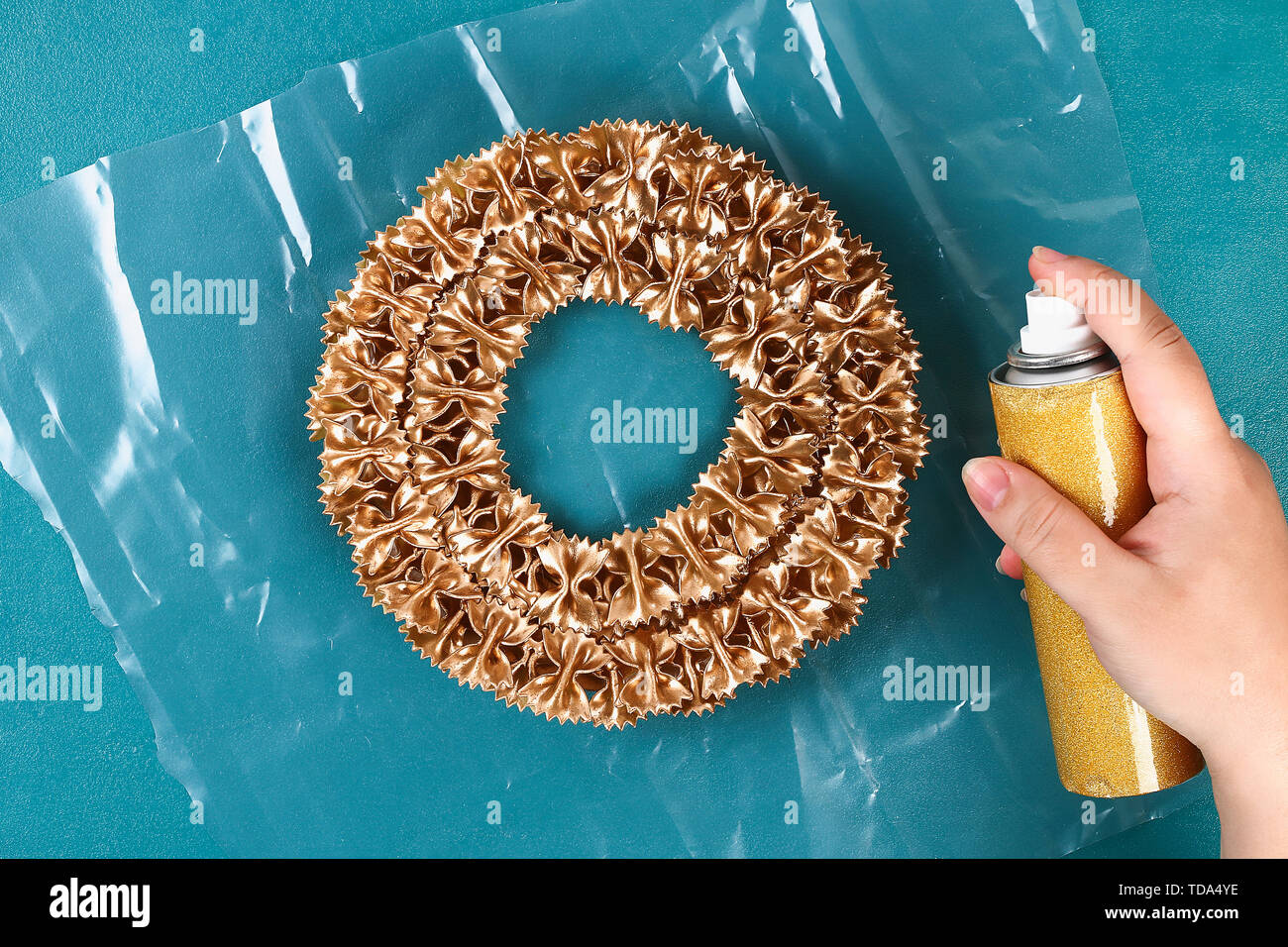 Diy Christmas pasta wreath on blue background. Gift idea, decor ...