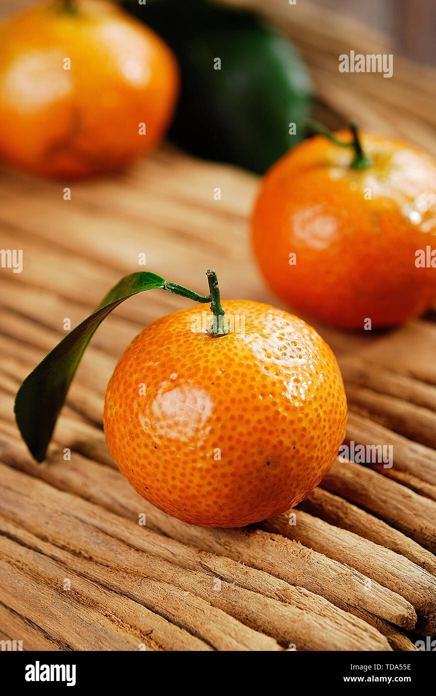 Sugar orange on an elm board Stock Photo - Alamy