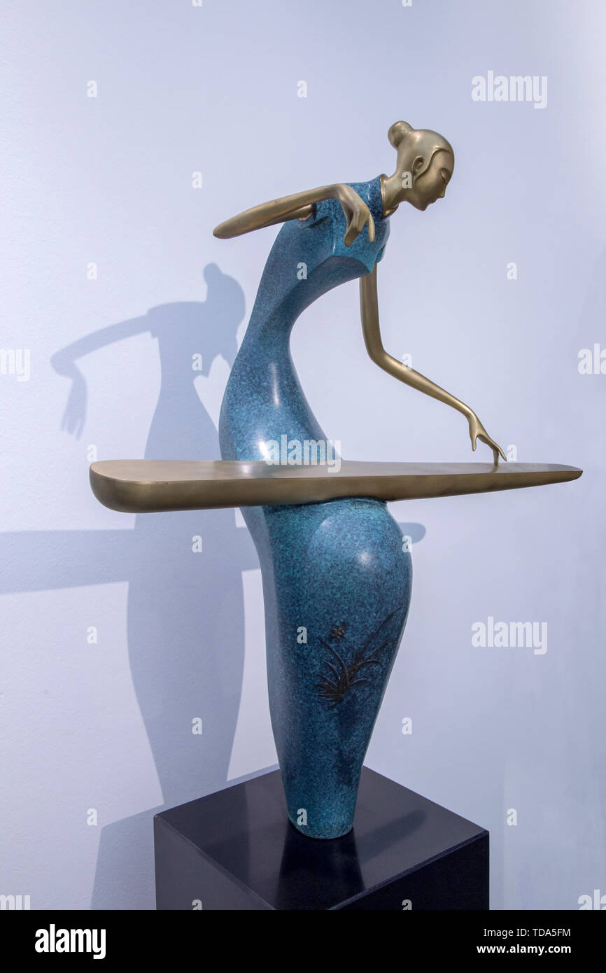 Female sculpture of Chinese musical instruments Stock Photo - Alamy