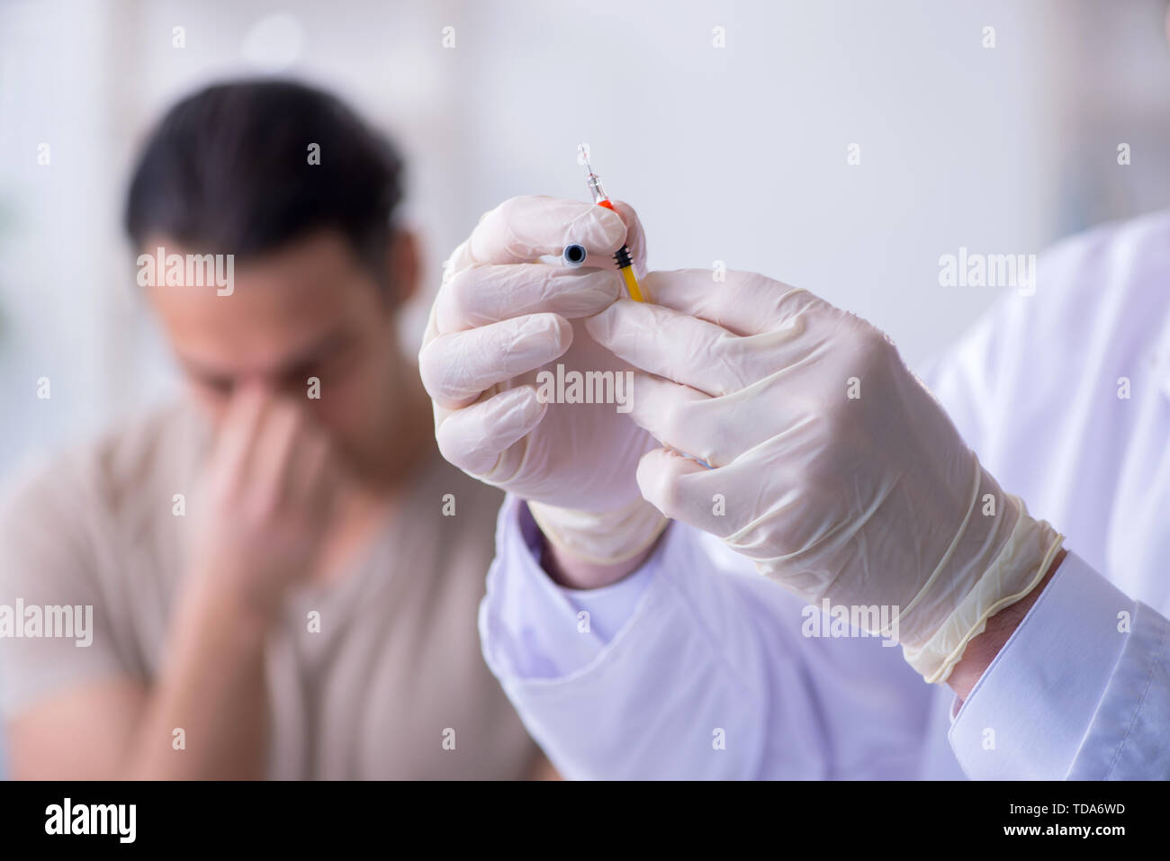 Male patient visitng doctor hi-res stock photography and images - Alamy