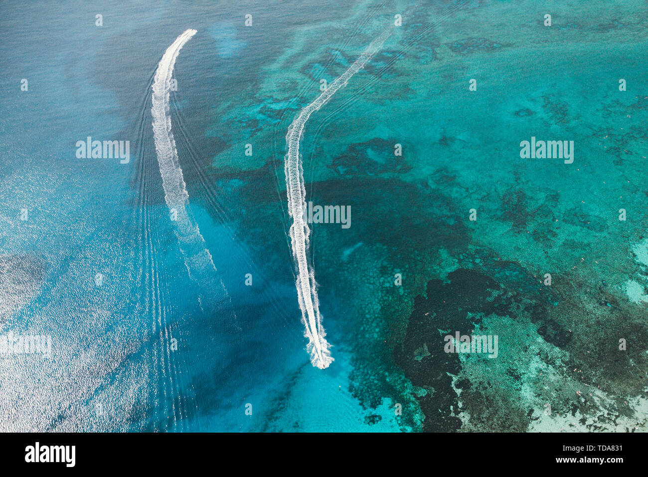 Marine fun on the water bikes. Aerial view of speed boat in the sea ...