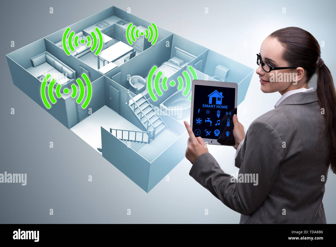 Smart home concept with woman Stock Photo - Alamy