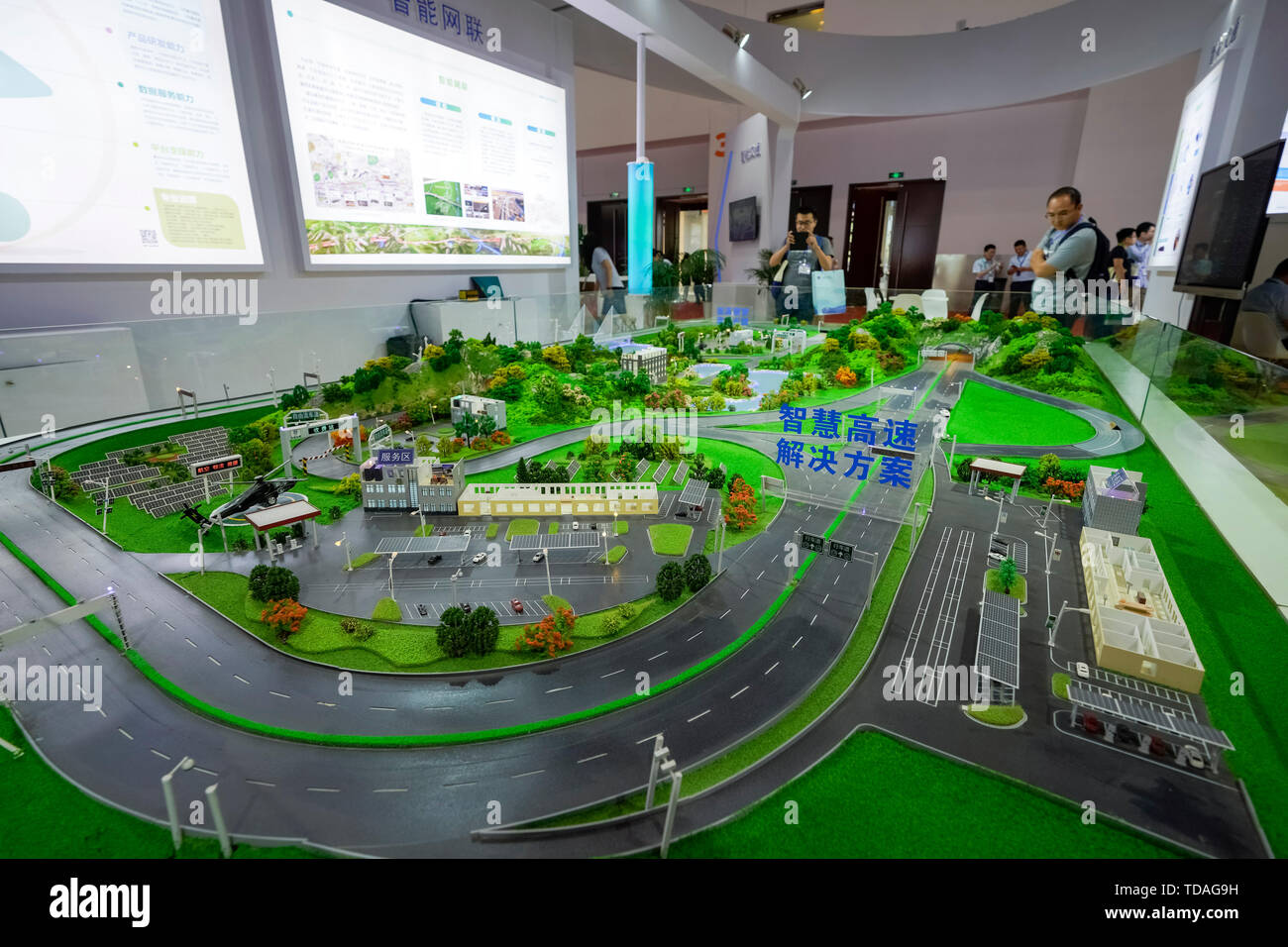 Beijing, China. 14th June, 2019. Visitors view a sand table about a ...