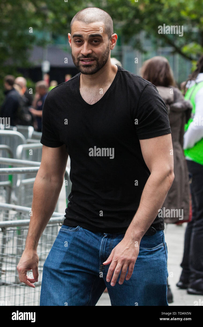 London, UK. 14 June, 2019. Rapper Lowkey leaves after laying a floral ...
