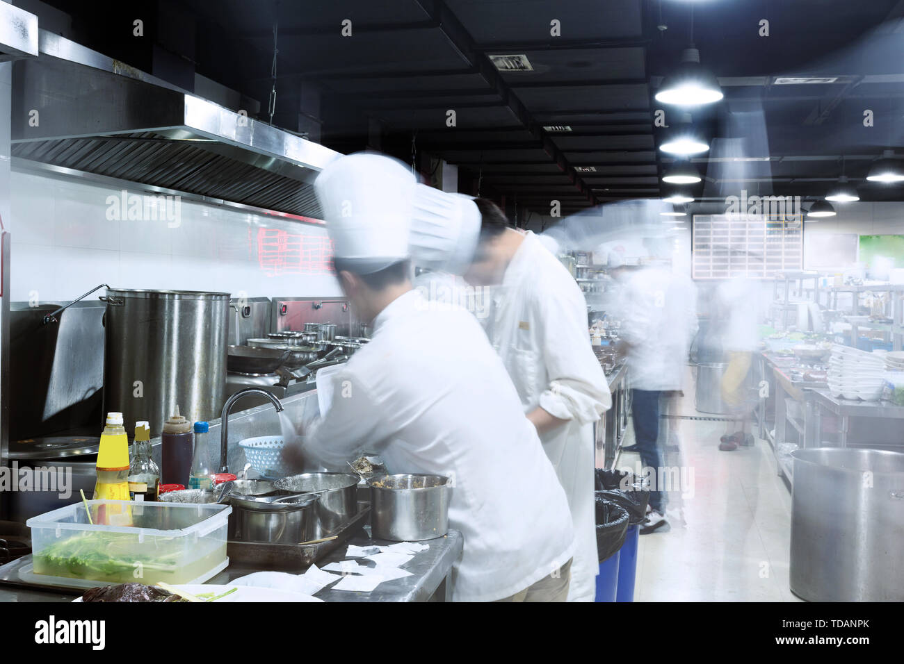 Modern and busy chefs Stock Photo - Alamy