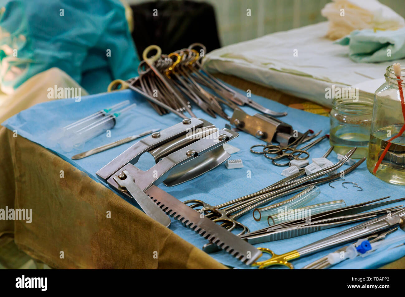 Medical team performing operation close up of medical instruments for ...