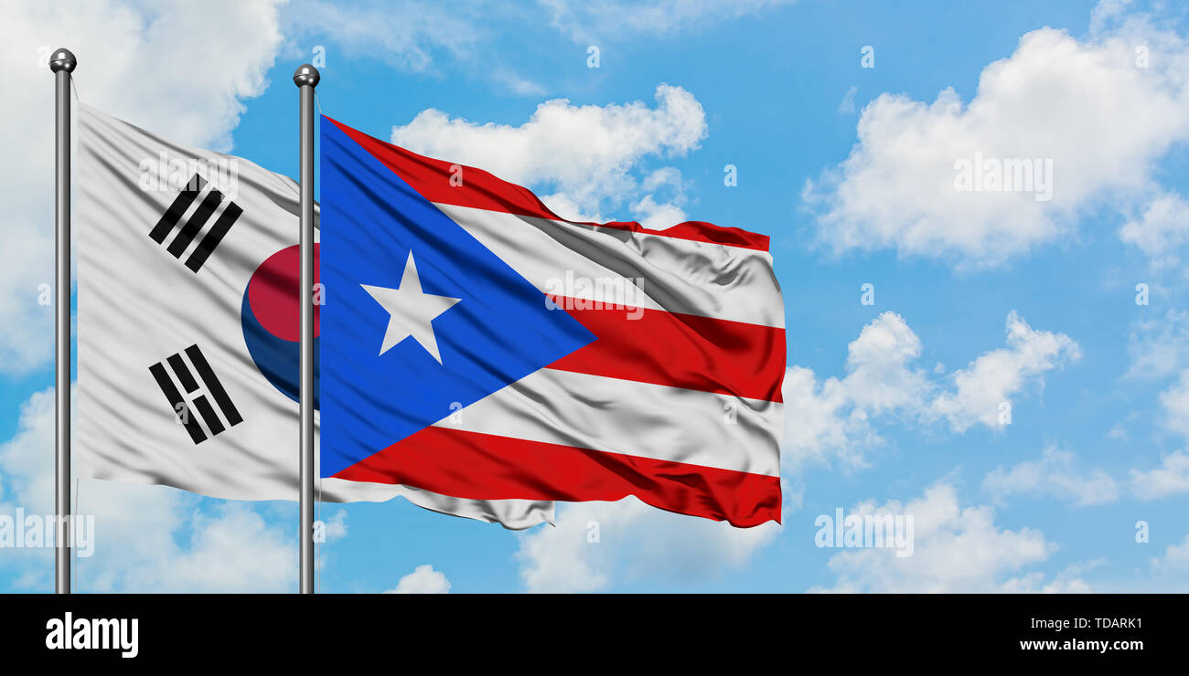 South Korea and Puerto Rico flag waving in the wind against white ...