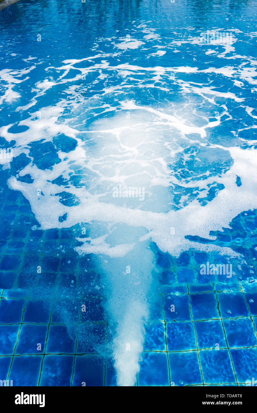 Massage and spa swimming pool with bubbles blue water Stock Photo - Alamy