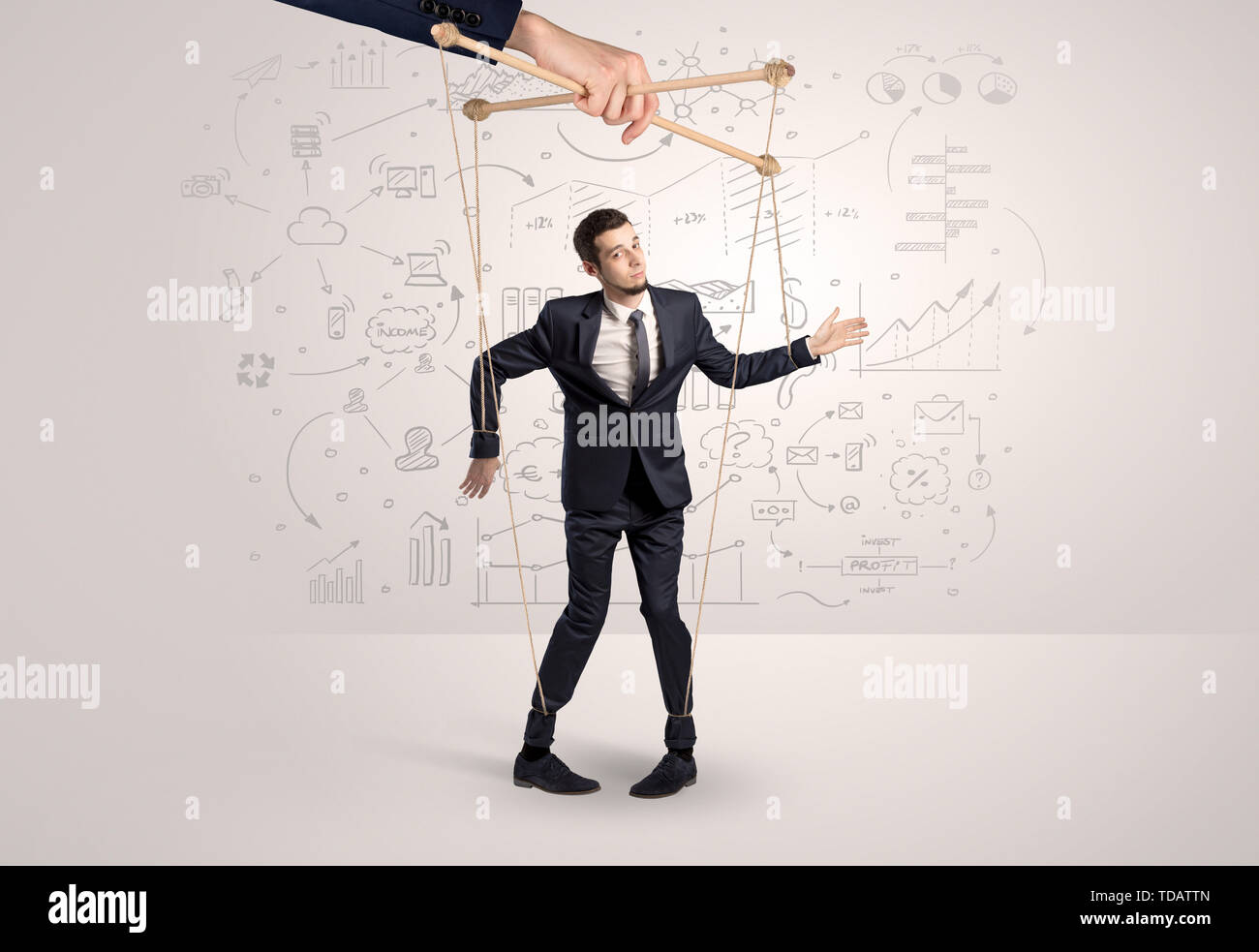 Little businessman controlled from above like a puppet concept Stock ...