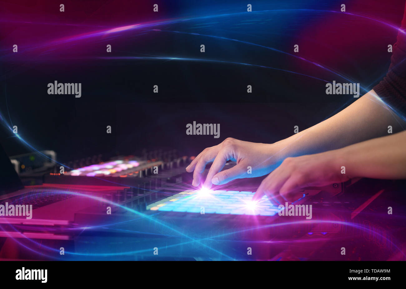 Hand mixing music on midi controller with wave vibe concept Stock Photo ...