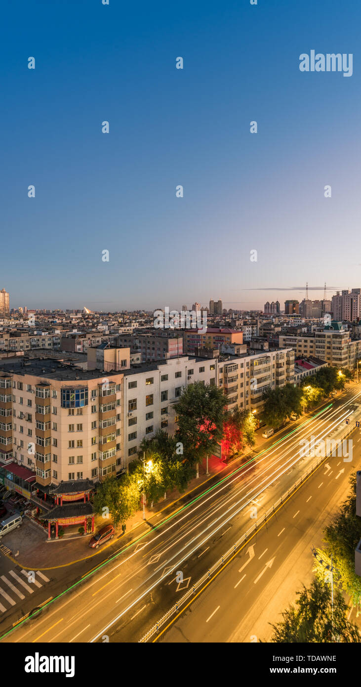 Autumn sunrise overlooks city building street in Harbin, China Stock ...