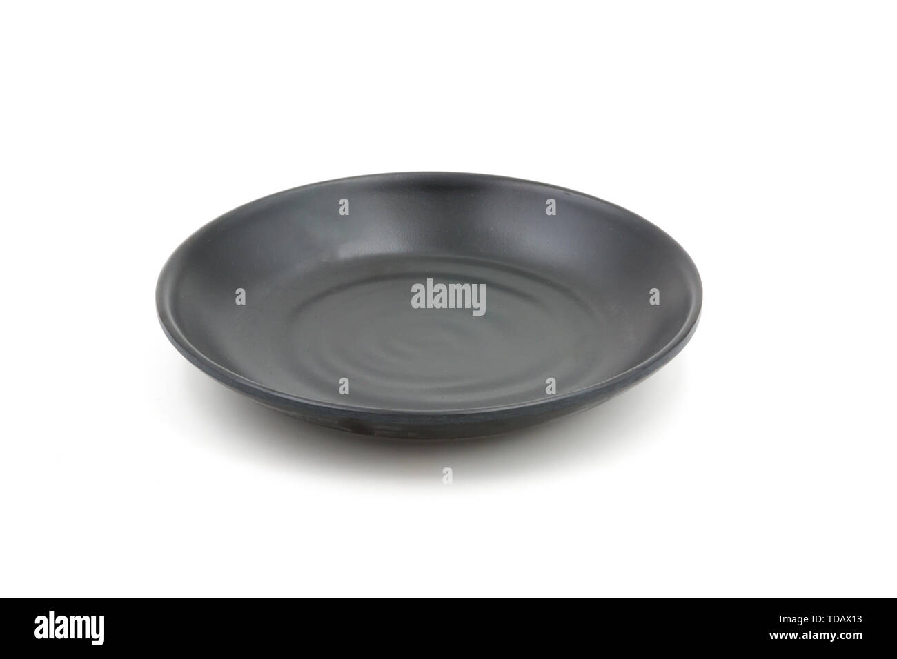 Black empty plate on white background Stock Photo - Alamy