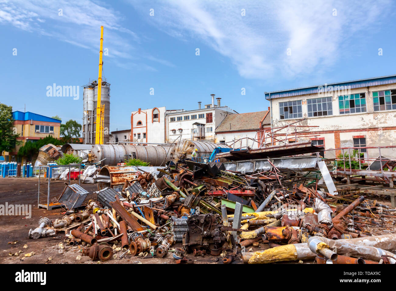 Piled up scrap metal, old profiles and equipment, parts of old ...