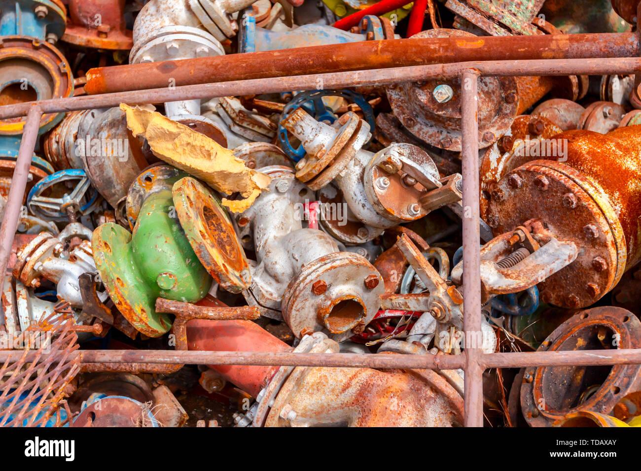 Different shapes and sizes of cut old valves and equipment, industrial ...