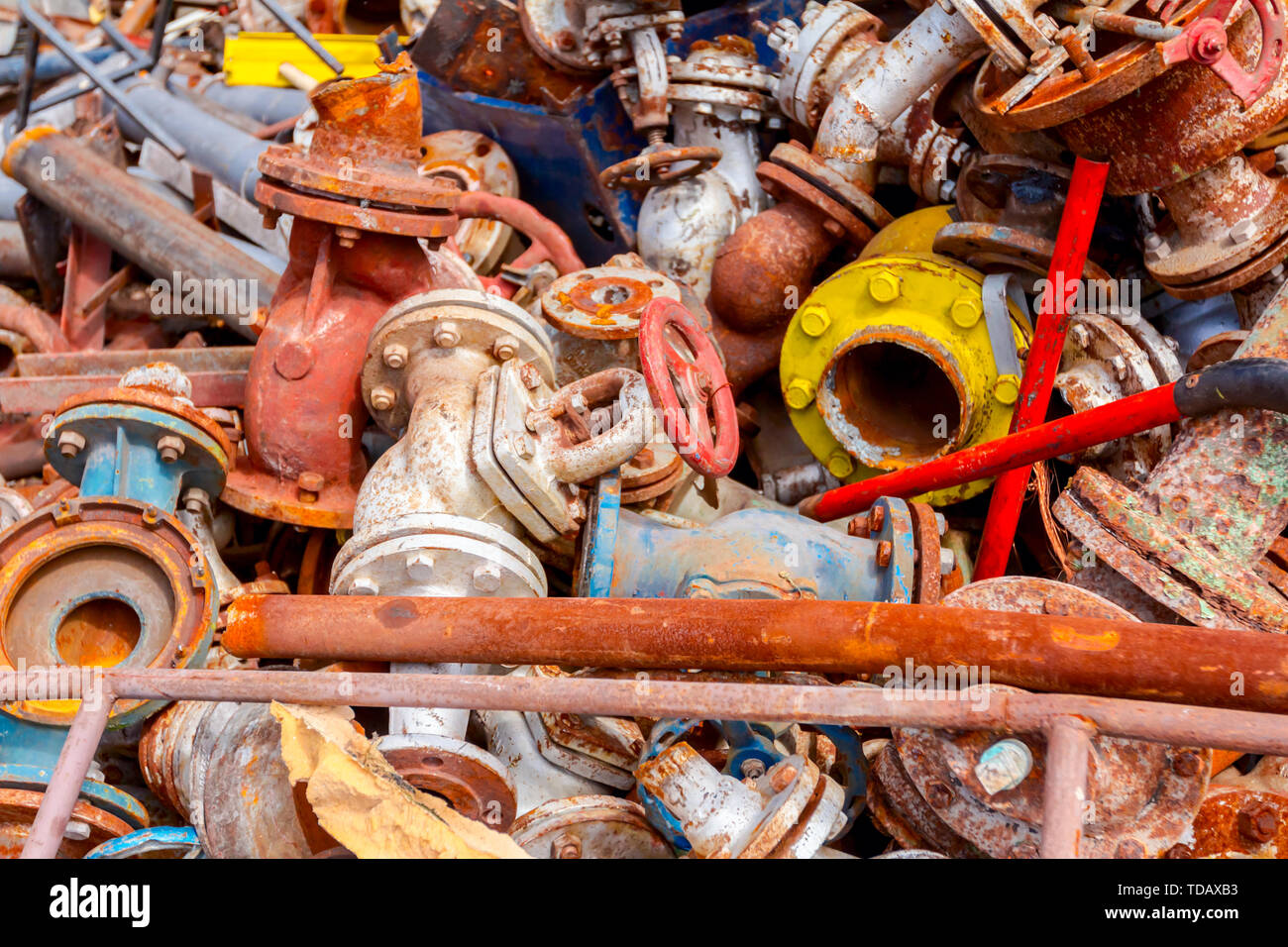 Different shapes and sizes of cut old valves and equipment, industrial ...