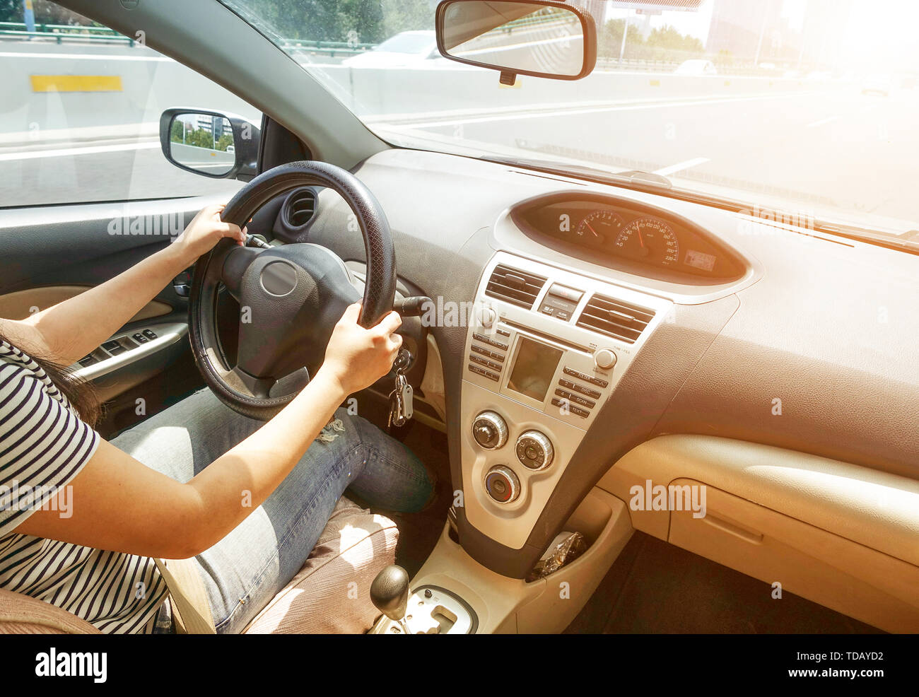 Female driver driving in cab Stock Photo - Alamy