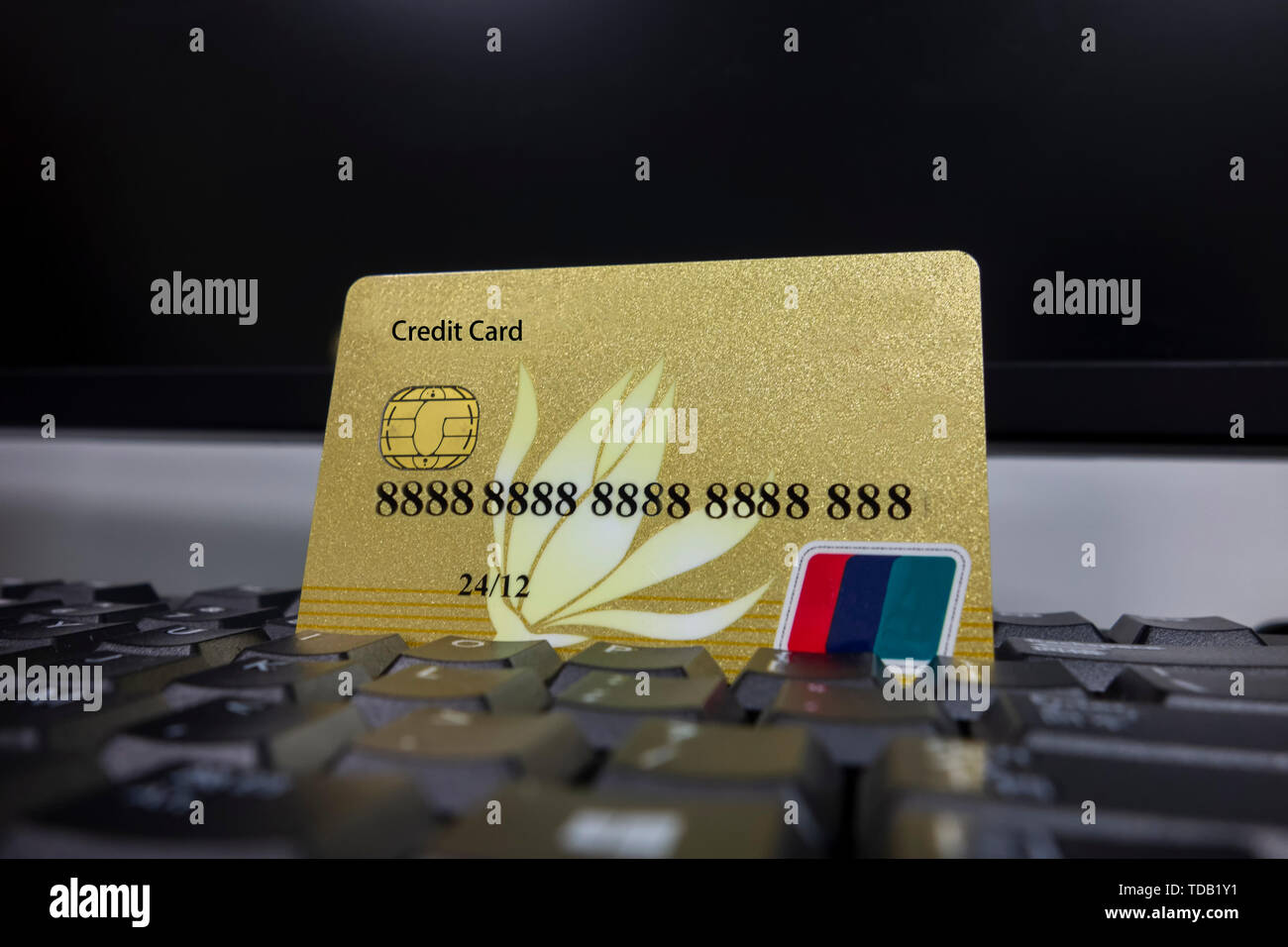 Credit card on the keyboard Stock Photo - Alamy