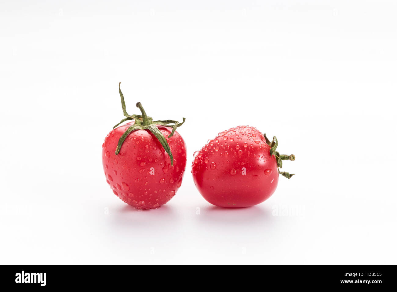 Delicious little tomatoes Stock Photo - Alamy