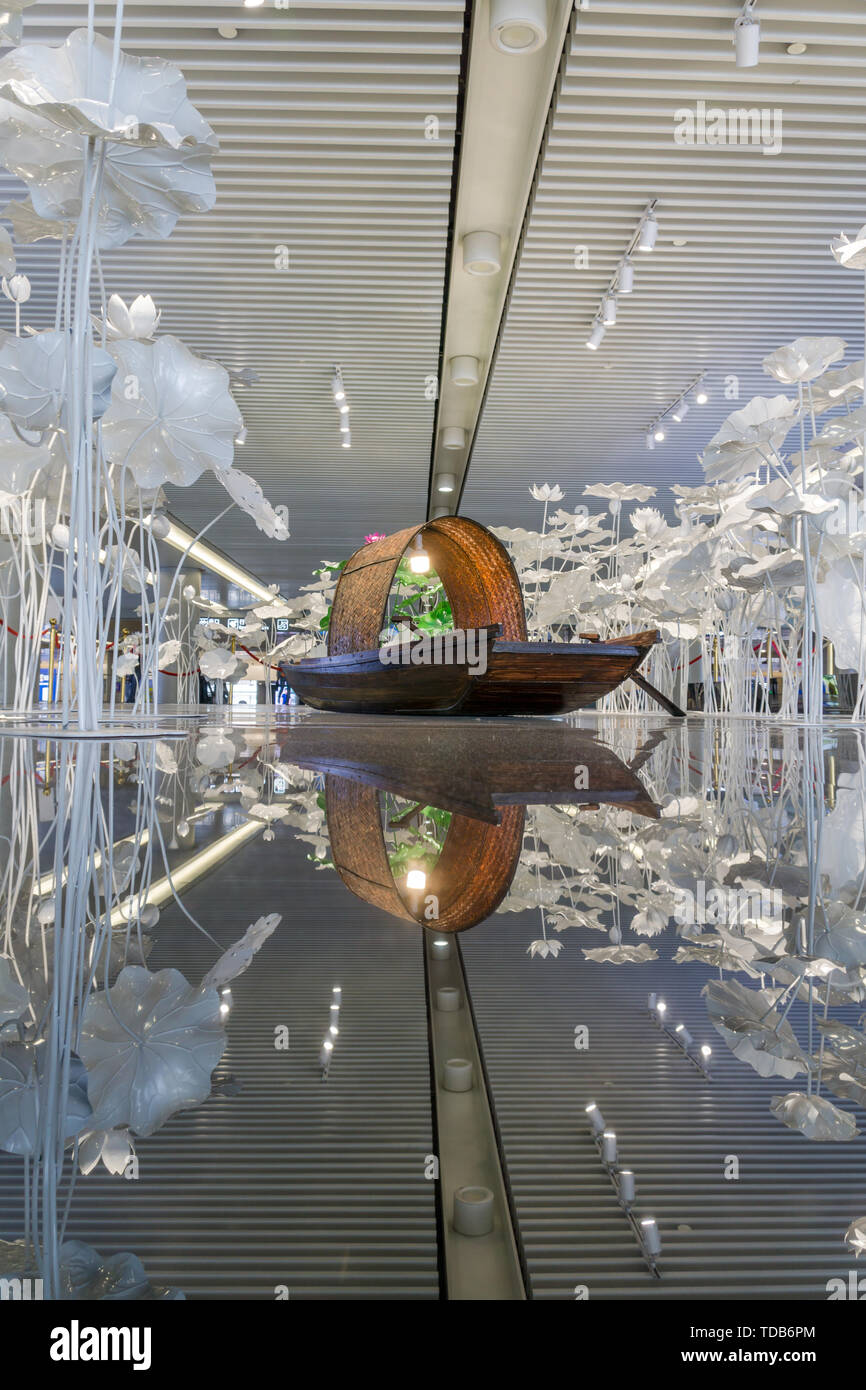 Fishing boats and lotus artwork Stock Photo - Alamy