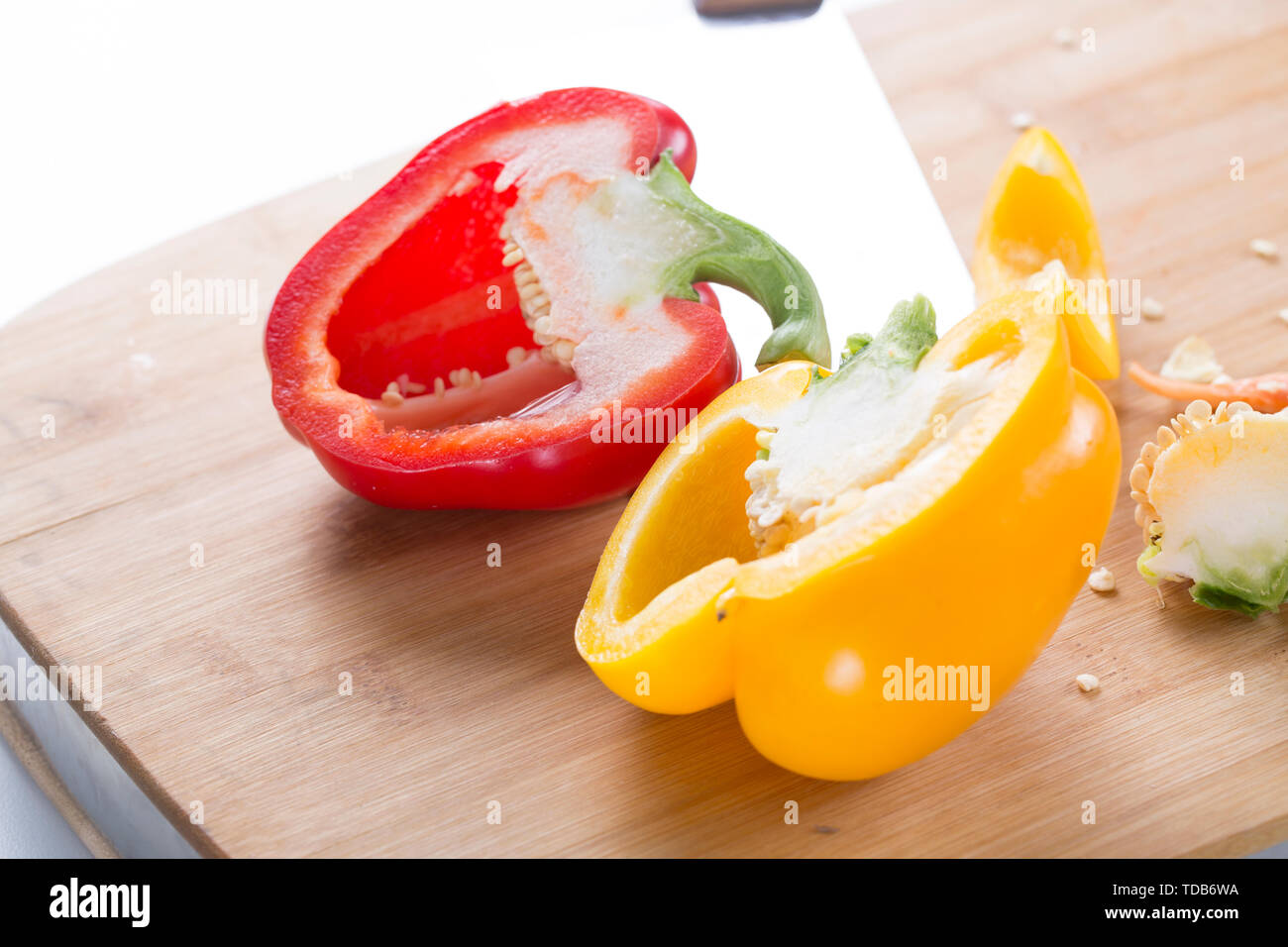Cutting, coloured peppers Stock Photo - Alamy