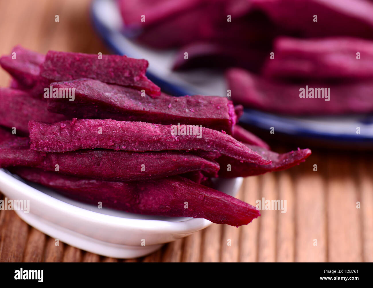 Purple potato dried purple potato strips Stock Photo - Alamy