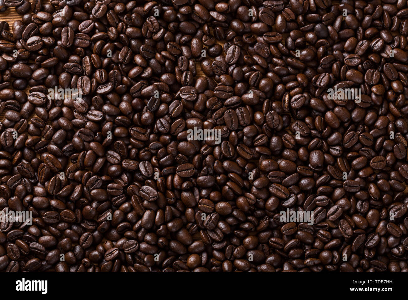 Coffee beans on the table Stock Photo - Alamy