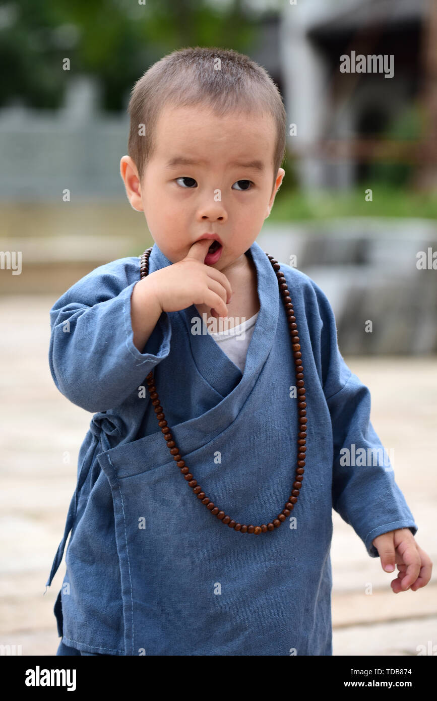 Cute little monk, children's photography Stock Photo - Alamy