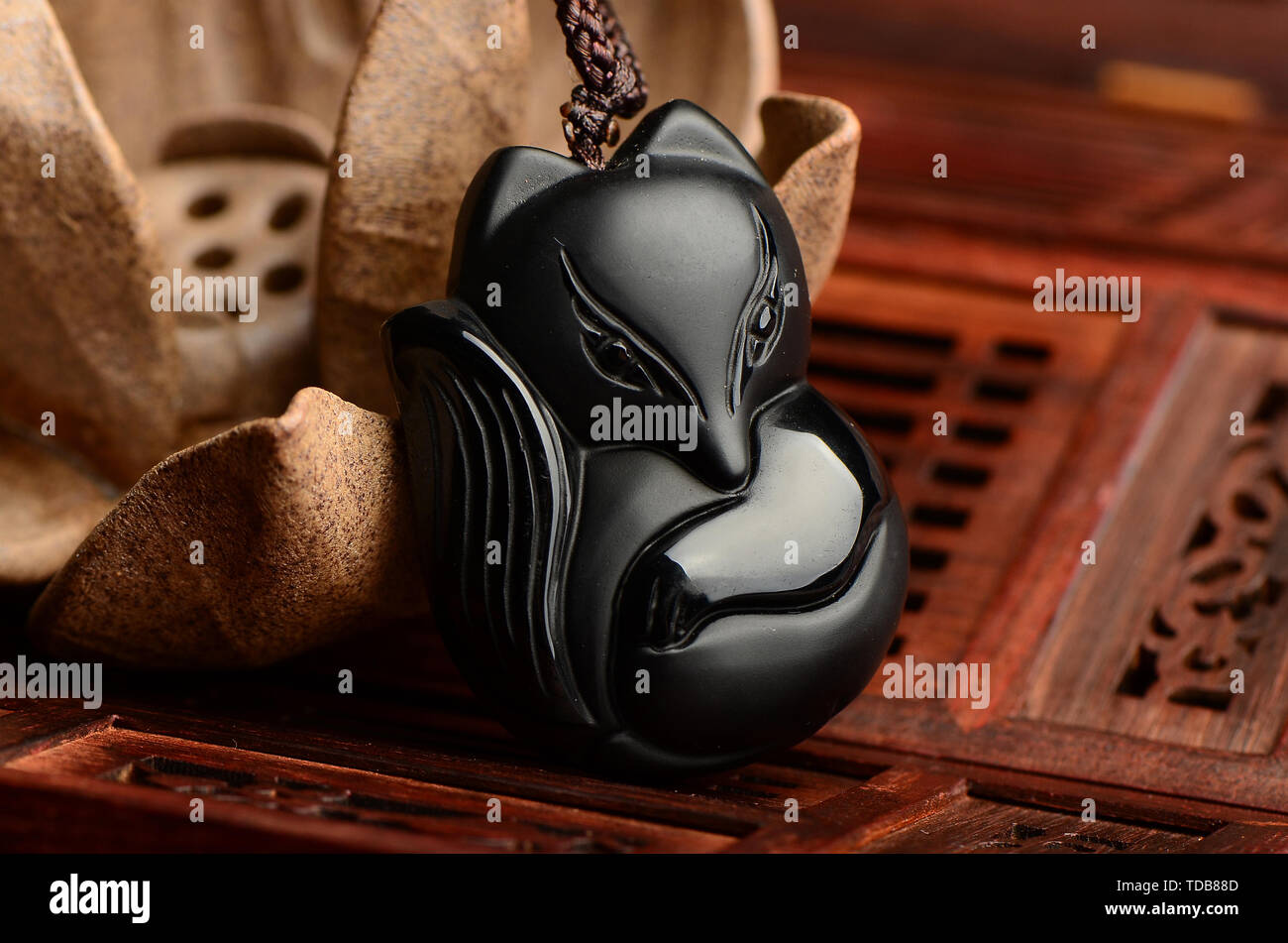 Fox Obsidian pendant Stock Photo - Alamy