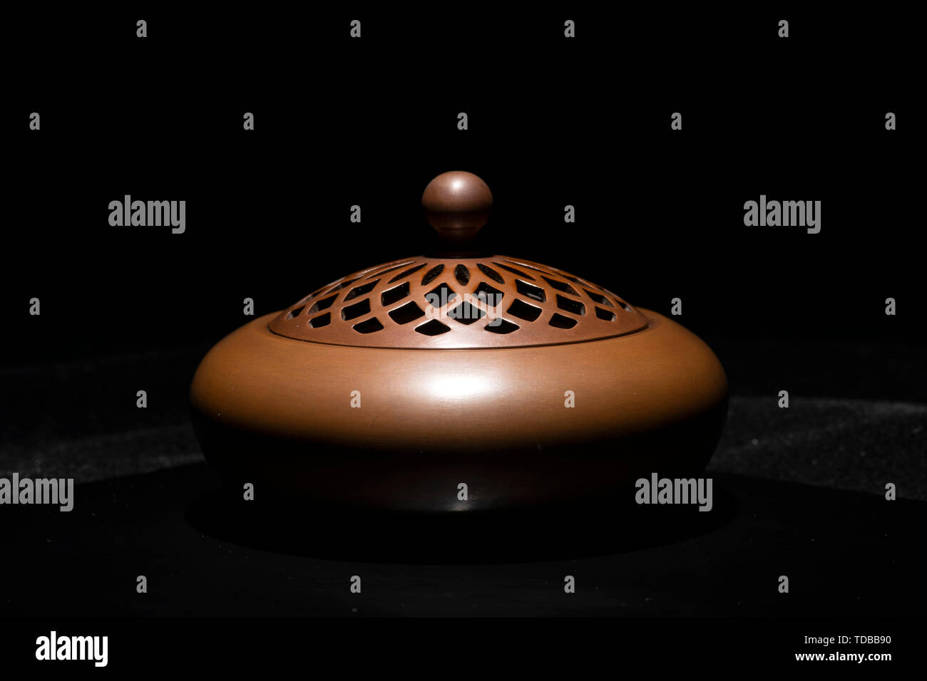 Copper incense stove Stock Photo - Alamy