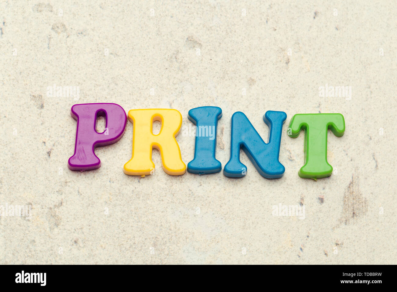 The word "PRINT" written in plastic colorful letters Stock Photo - Alamy
