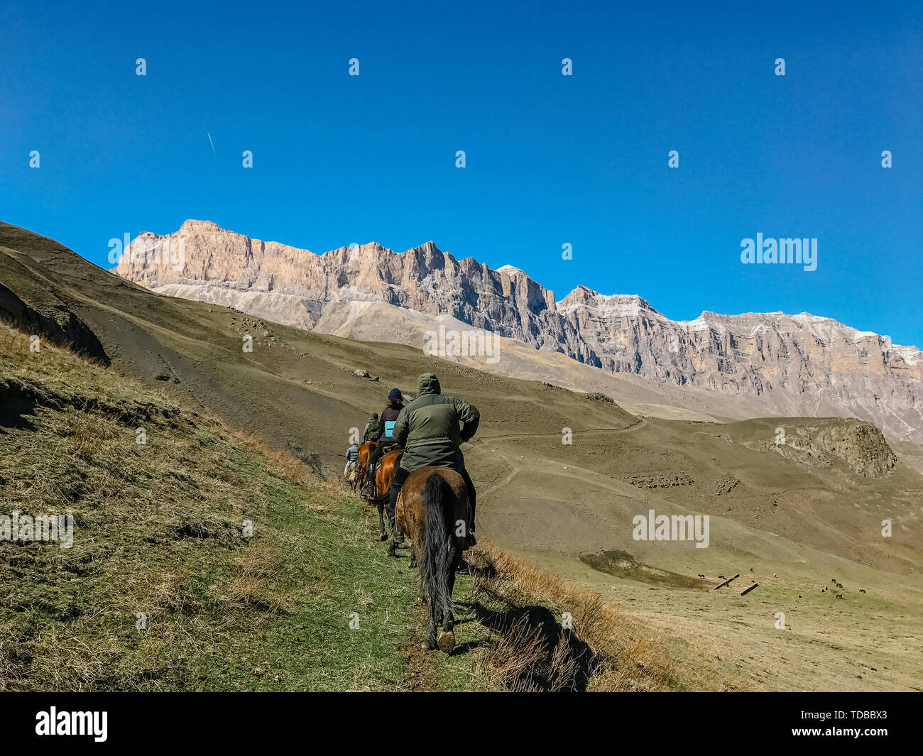Rear view riders on horseback hi-res stock photography and images - Alamy