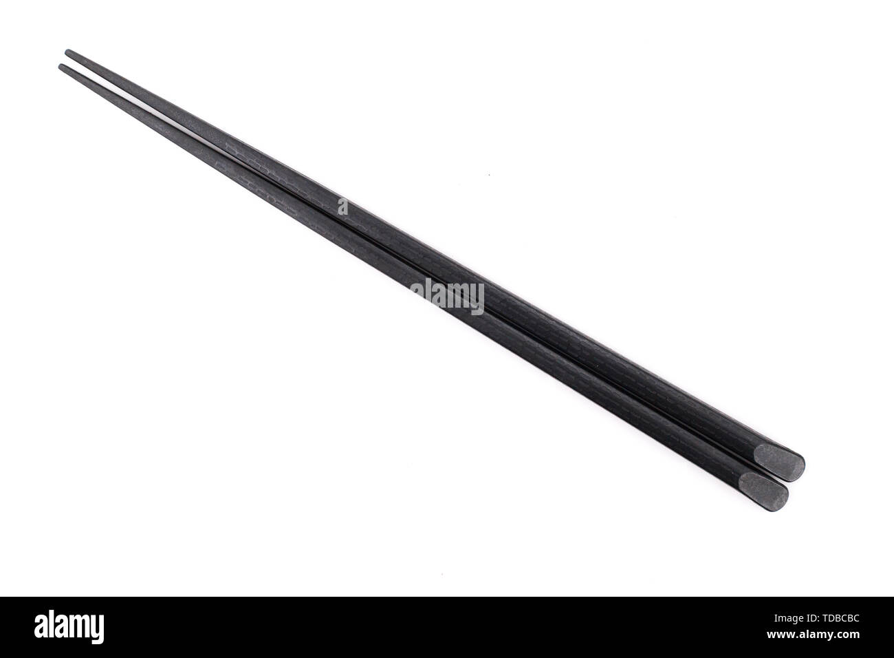 Chopsticks on empty plate Cut Out Stock Images & Pictures - Alamy