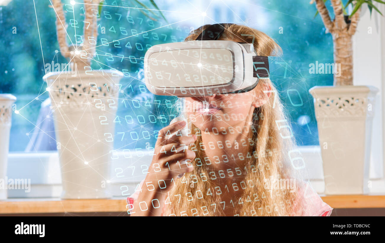 VR goggles home video gaming, girl using wearable technology Stock ...